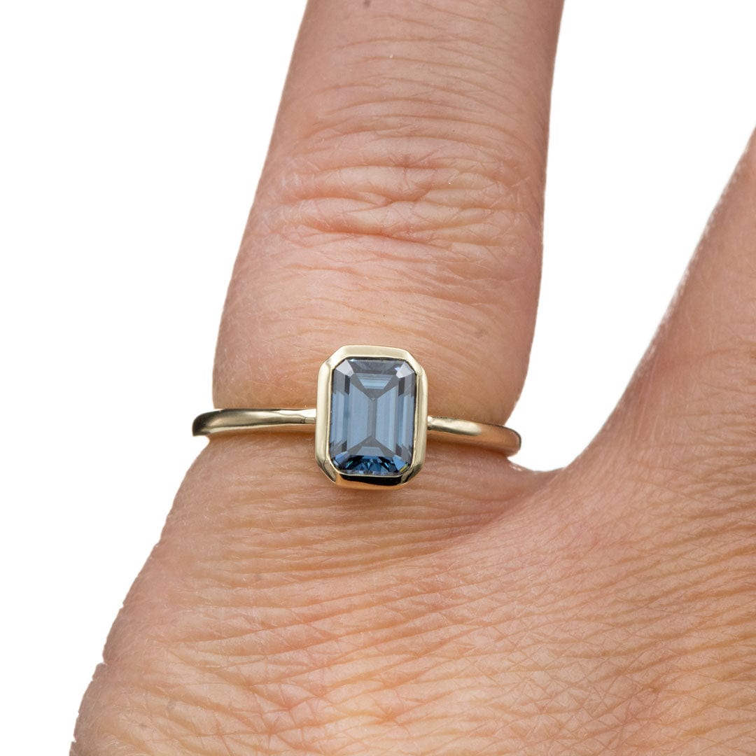 Emma Bezel Set Blue-Gray Emerald Cut Moissanite Solitaire Engagement R ...